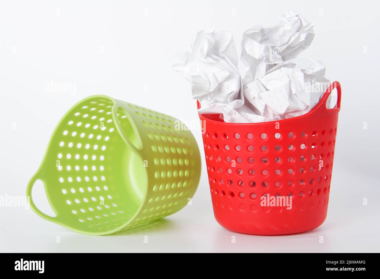 Two baskets. The green basket is empty - the red one is full. Emptying ...
