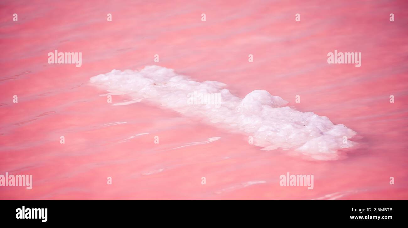 Pink salt crystals. Natural pink salt lake texture. Salt mining ...