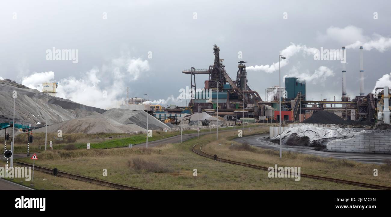 Steel factory plant with chimneys in the Netherlands Stock Photo - Alamy