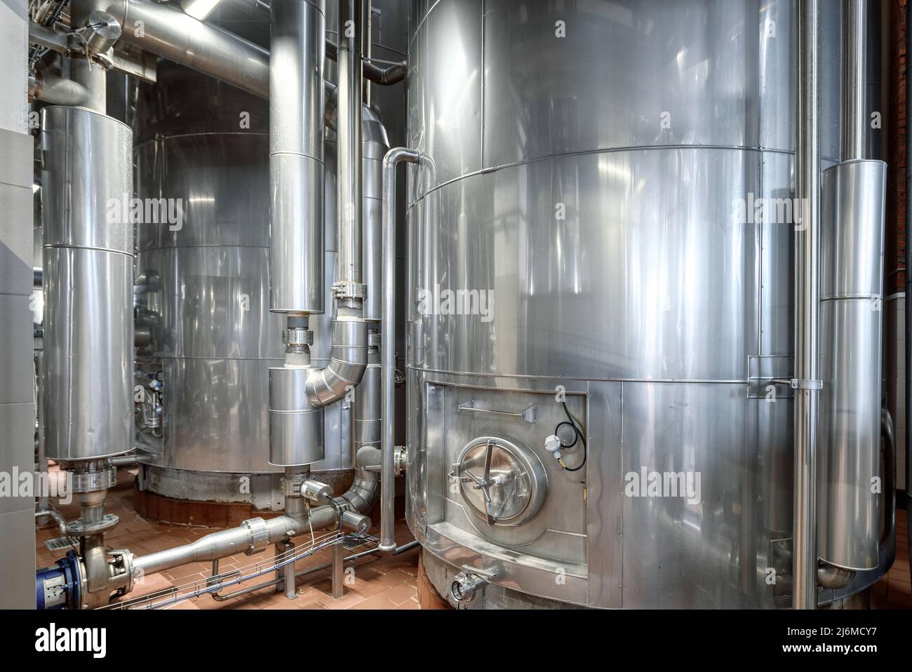 Large yeast fermentation tanks. Industrial production of beer Stock ...