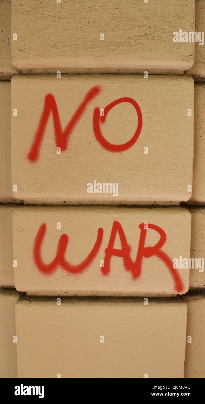 No war, isolated red text written on the wall Stock Photo - Alamy