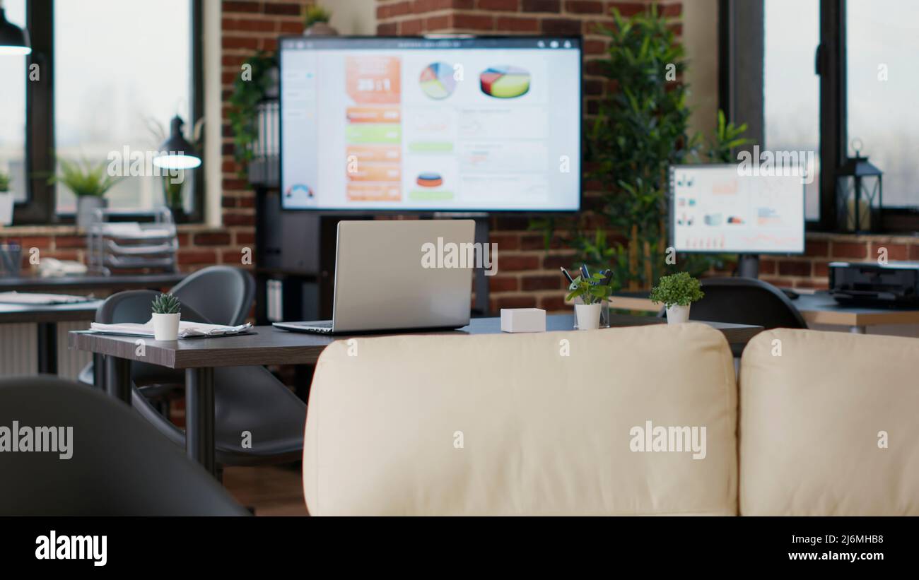 No people in empty company office with desks and laptops, computers to ...