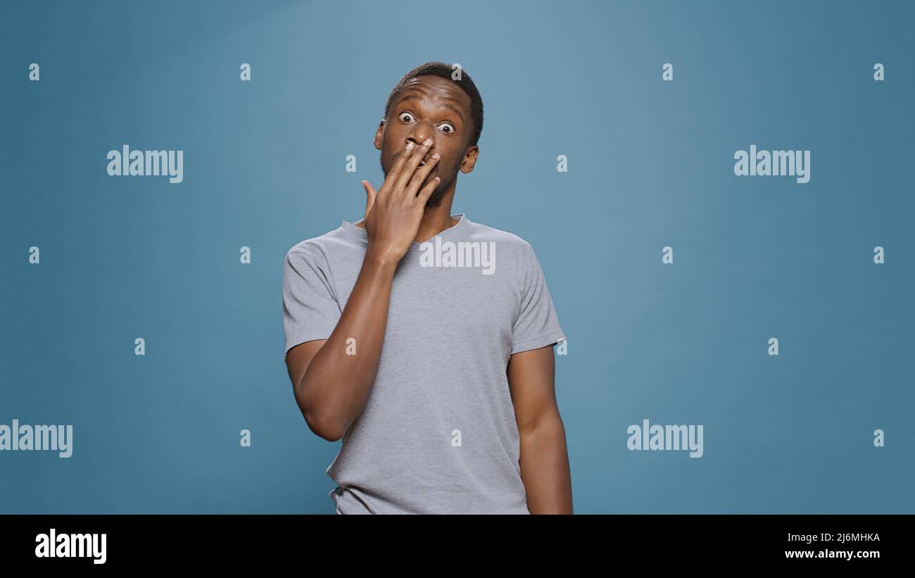 Portrait of male model advertising refuse and stop gesture, doing no ...