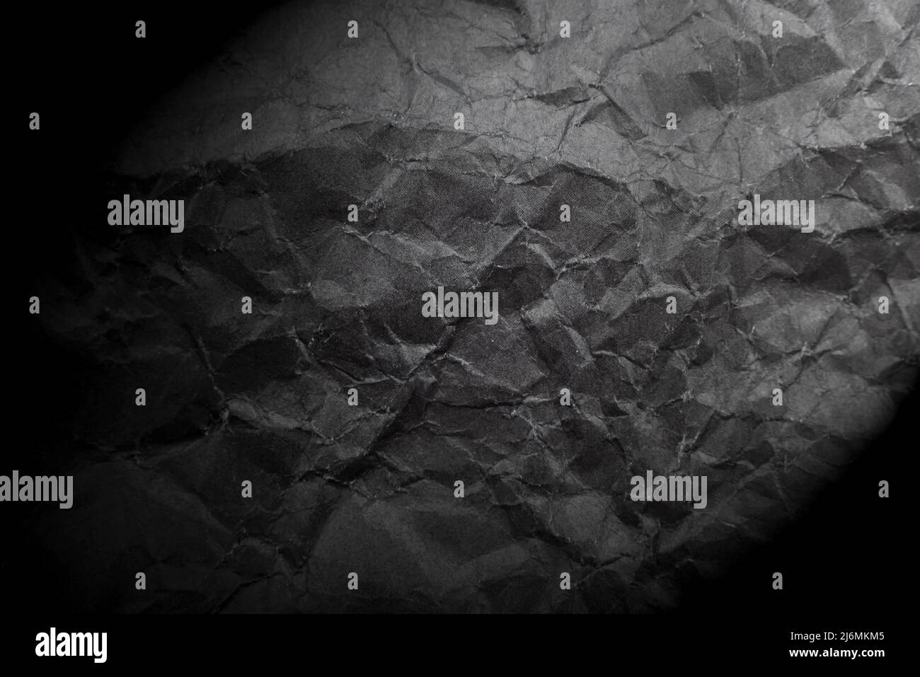 Background from crumpled black paper. Wrinkled paper with black ...