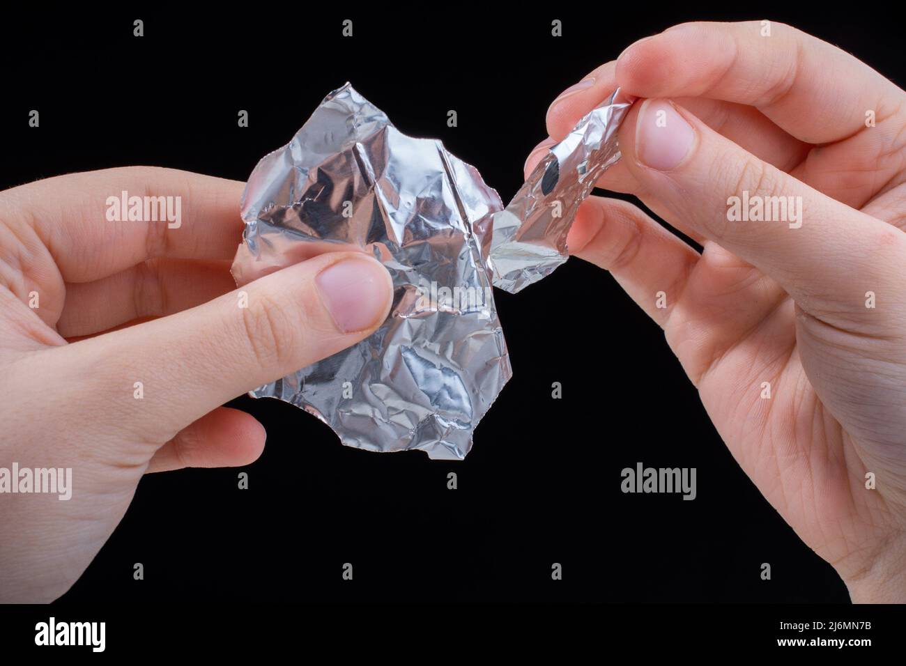 Tearing material hi-res stock photography and images - Alamy