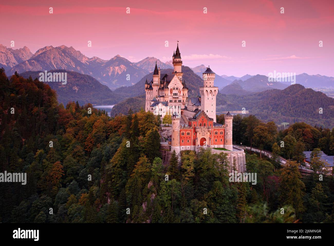 Beautiful evening view of the Neuschwanstein castle, with autumn ...