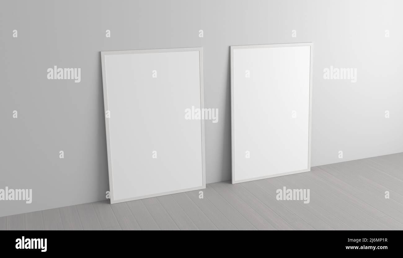 Mock up of two vertical frames on the floor in white interior. 3d ...