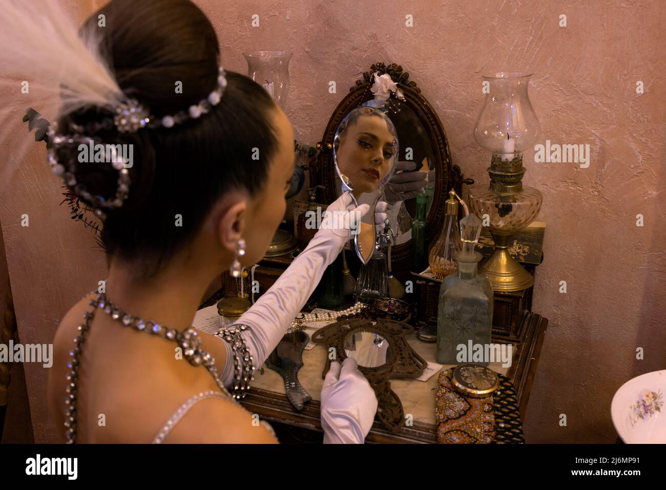 Dancer Claudine poses inside the Moulin Rouge windmill on May 2, 2022 ...