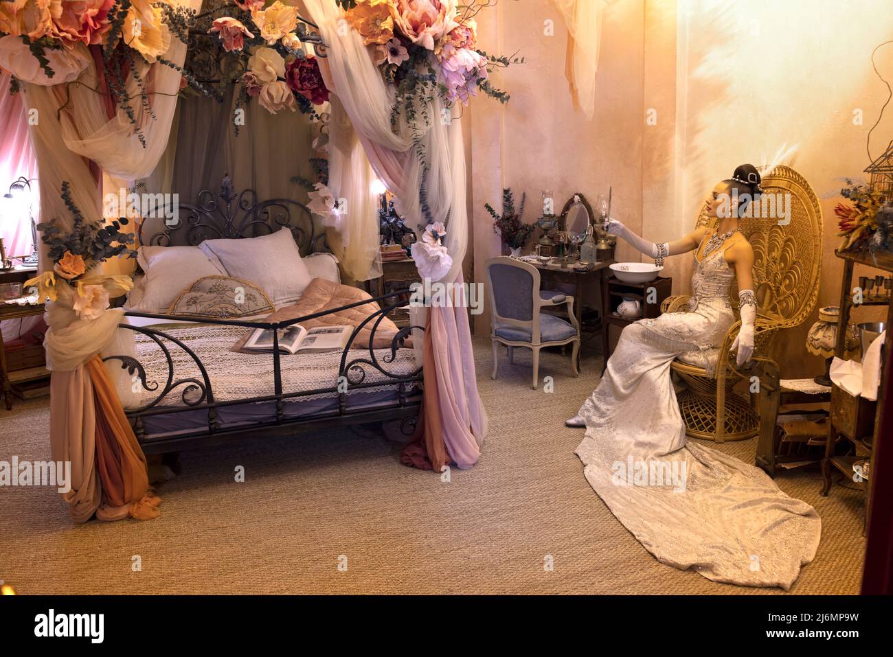 Dancer Claudine poses inside the Moulin Rouge windmill on May 2, 2022 ...
