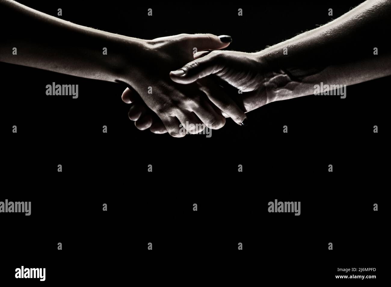 Handshake between the two partners. Rescue or helping gesture of hands ...