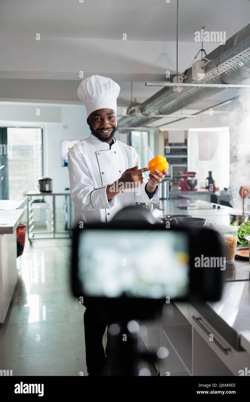 African american cook filming cooking hi-res stock photography and ...