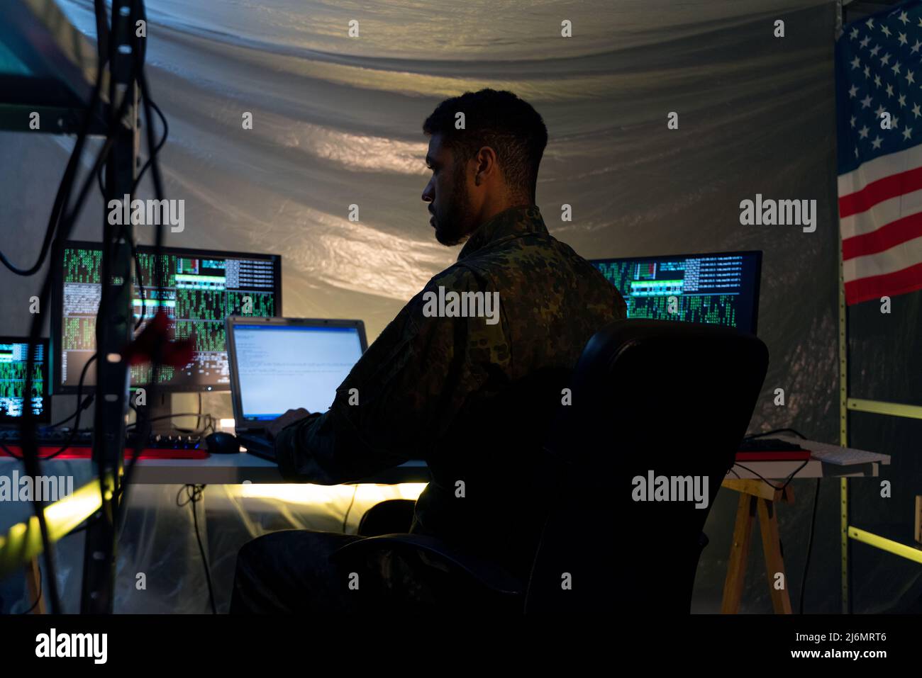 American hacker in military unifrorm on dark web, cyberwar concept ...
