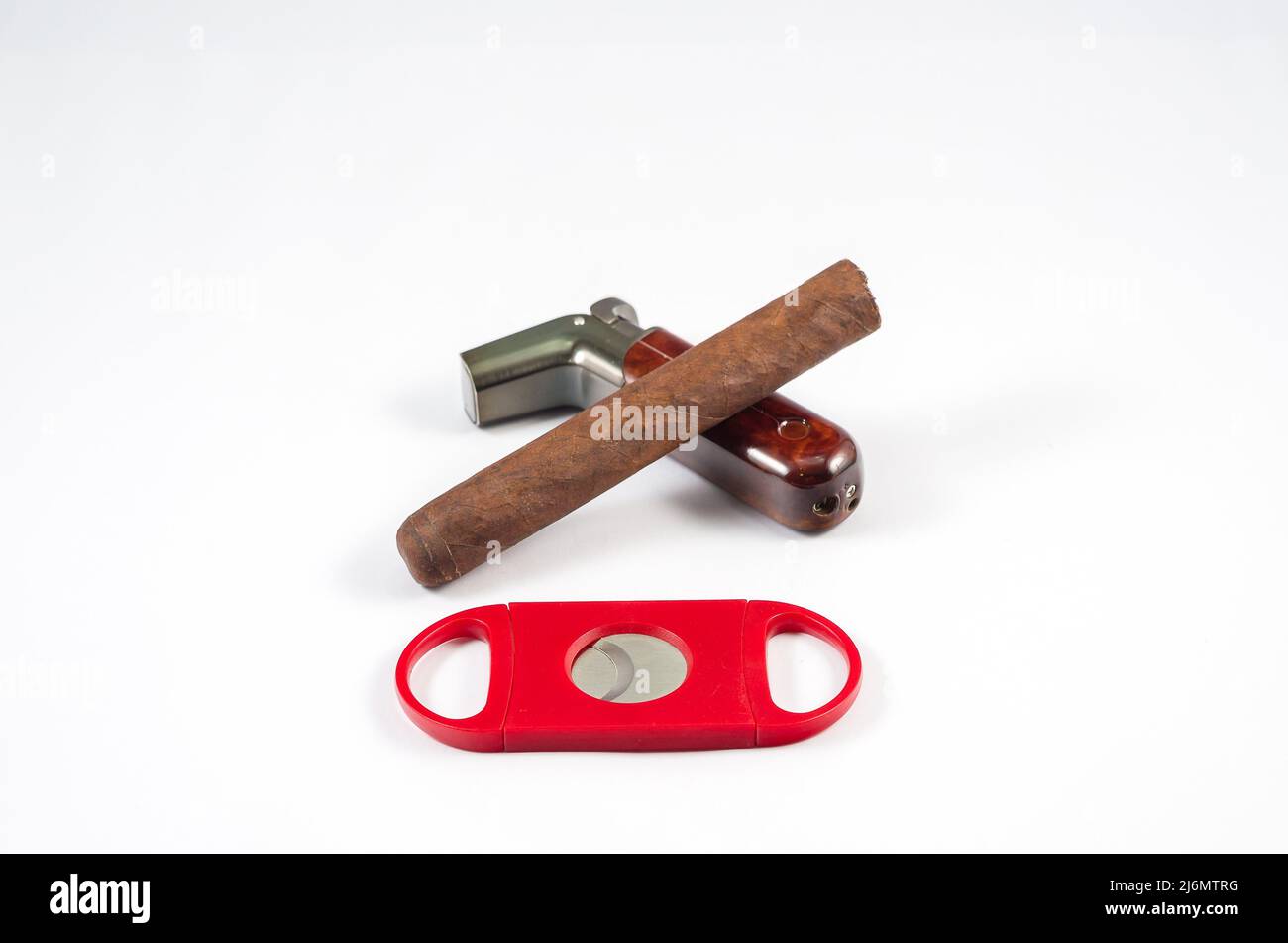 Cuban cigar with lighter on white background, Cuban culture, elegance ...