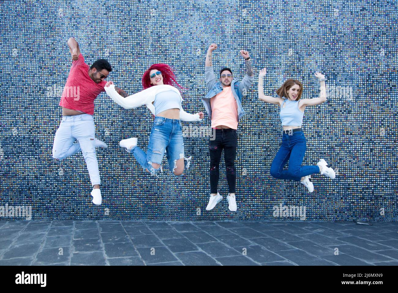 Four young happy friends having hi-res stock photography and images - Alamy
