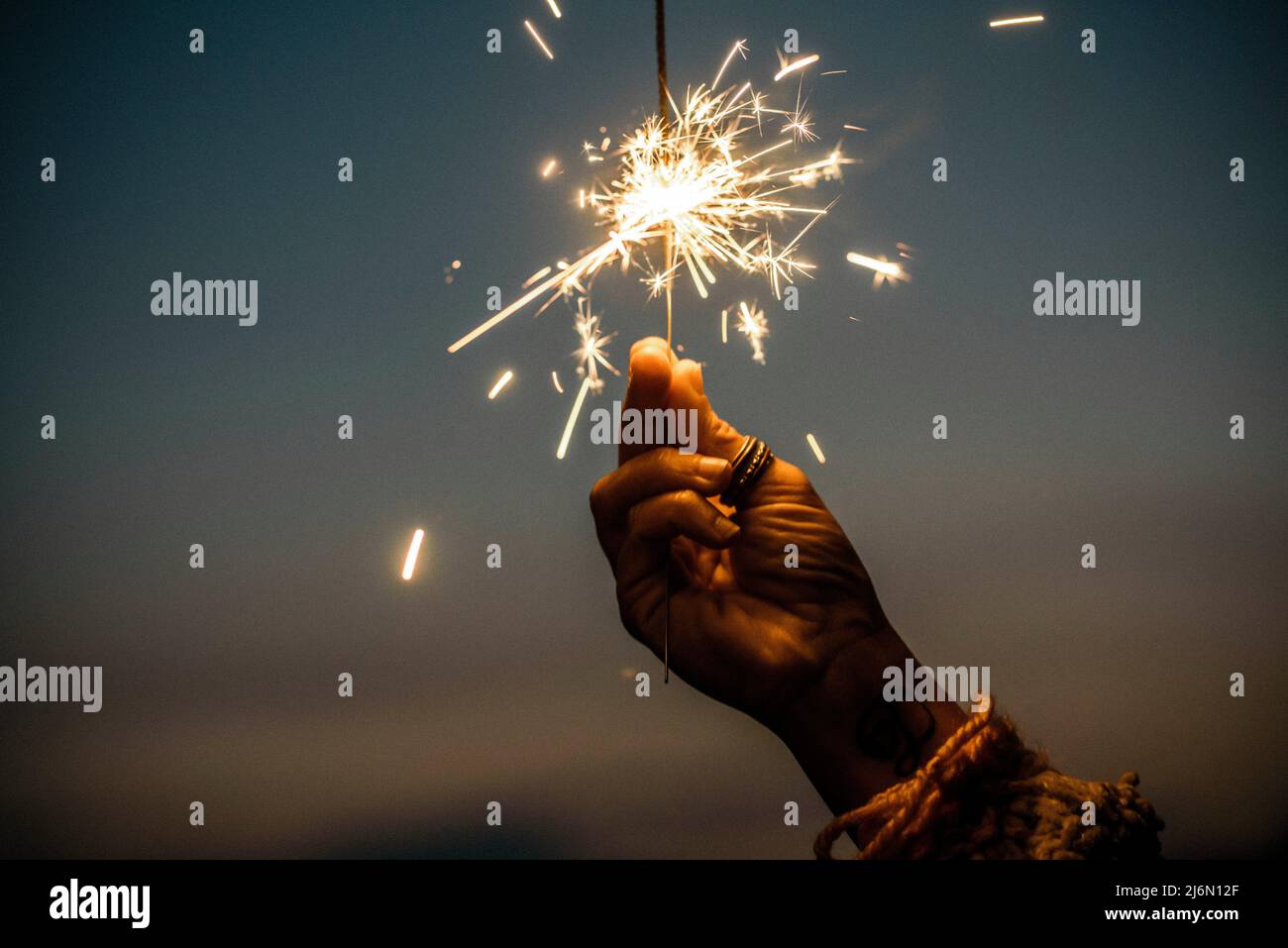 Hand firework hi-res stock photography and images - Alamy