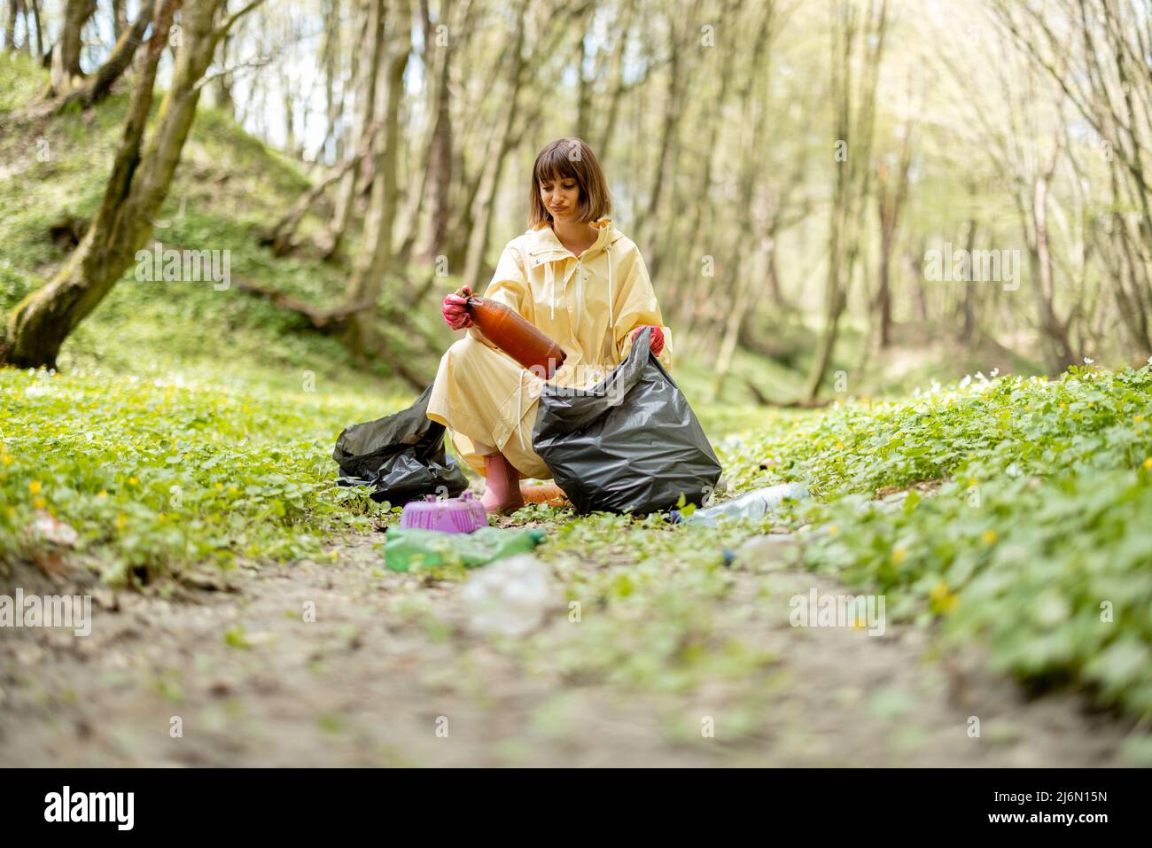 Collecting plastic in nature hi-res stock photography and images - Alamy