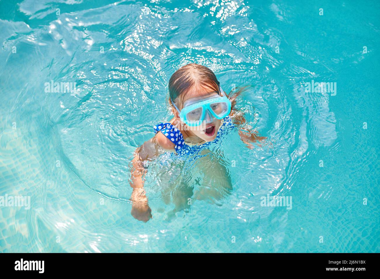 Diving girl in swimsuit hi-res stock photography and images - Alamy