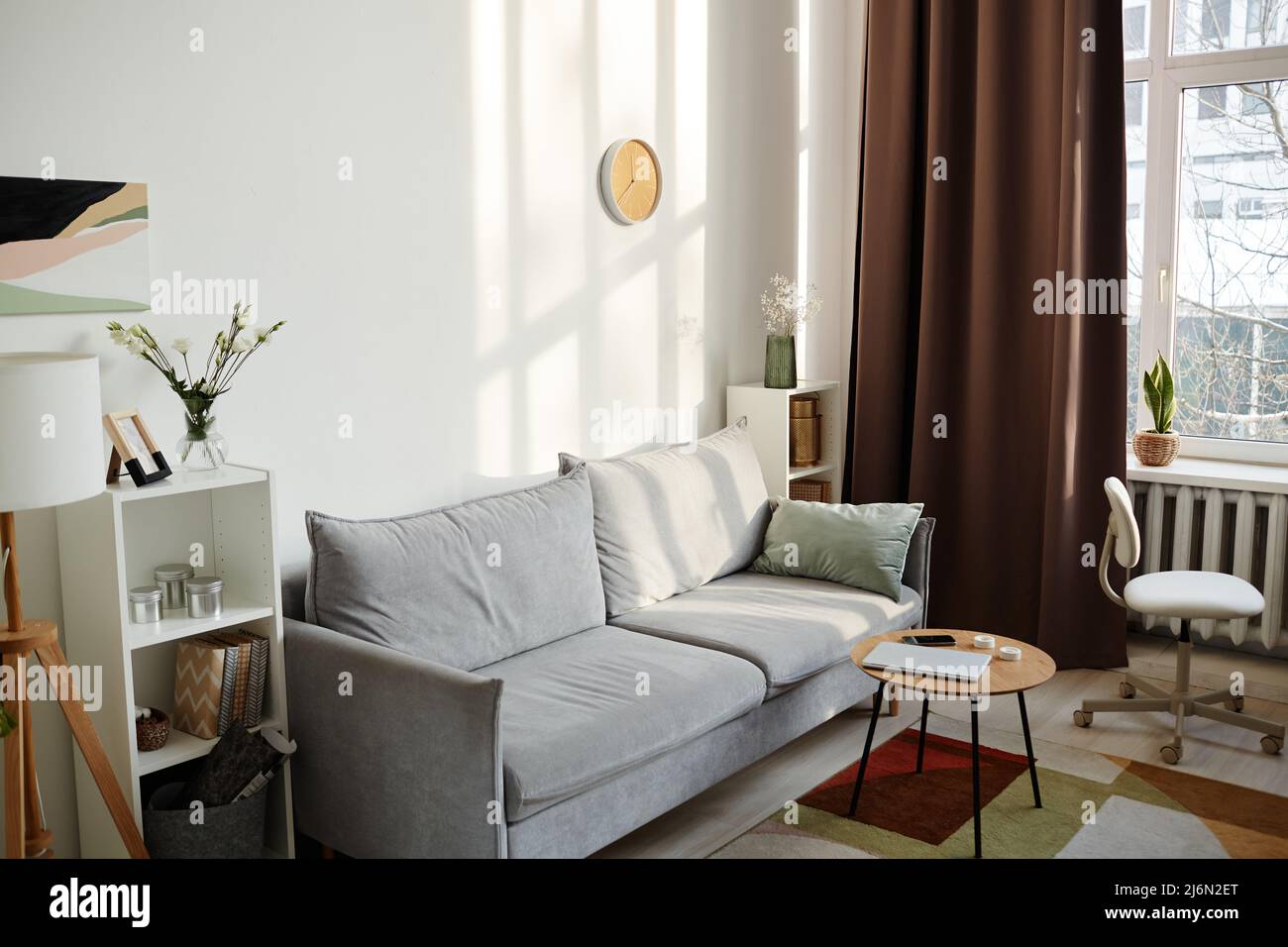 Sunlit background image of cozy living room interior with comfy velvet ...