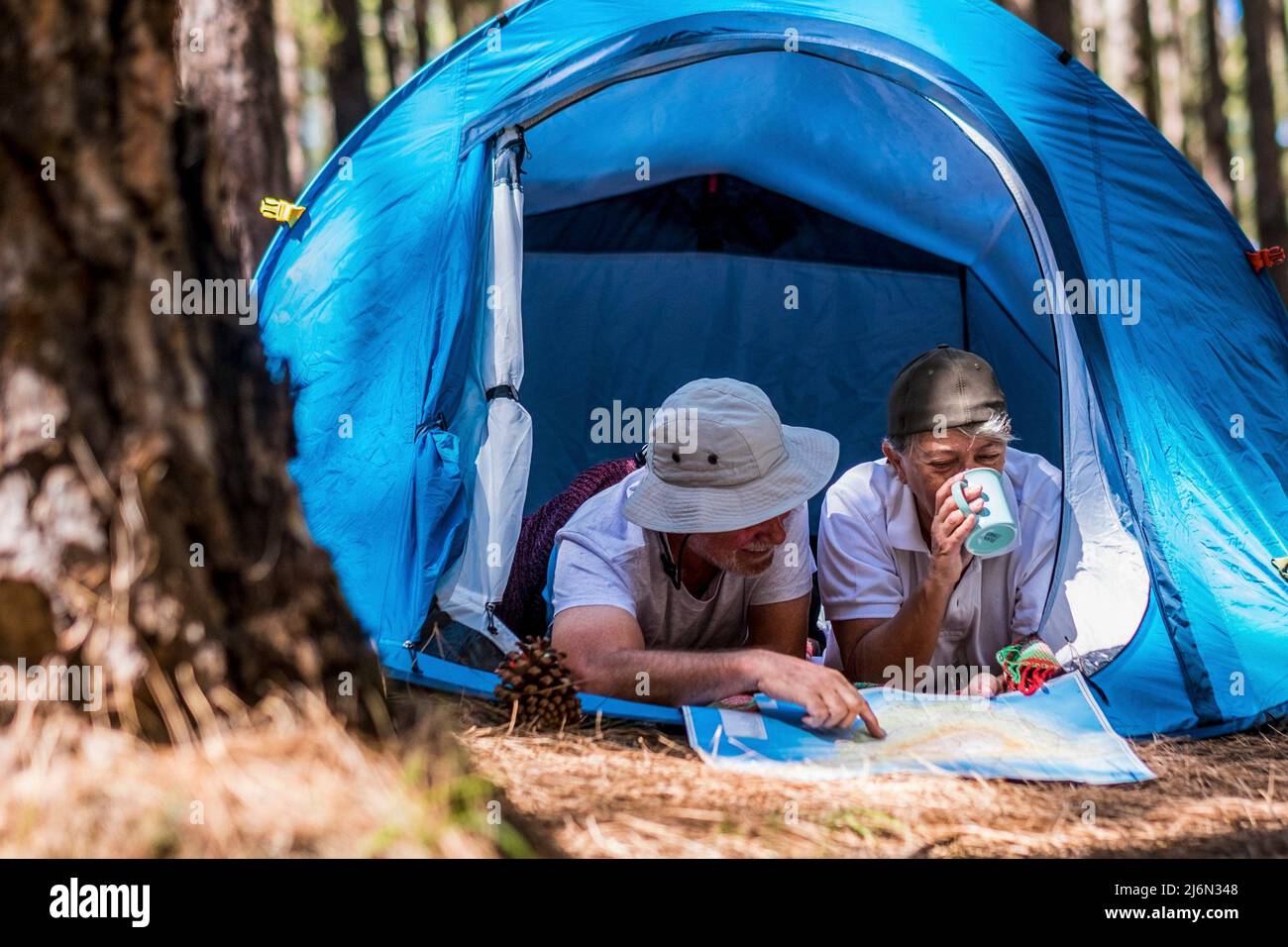 Retirement couple lifestyle enjoy travel tourism vacation laying inside ...