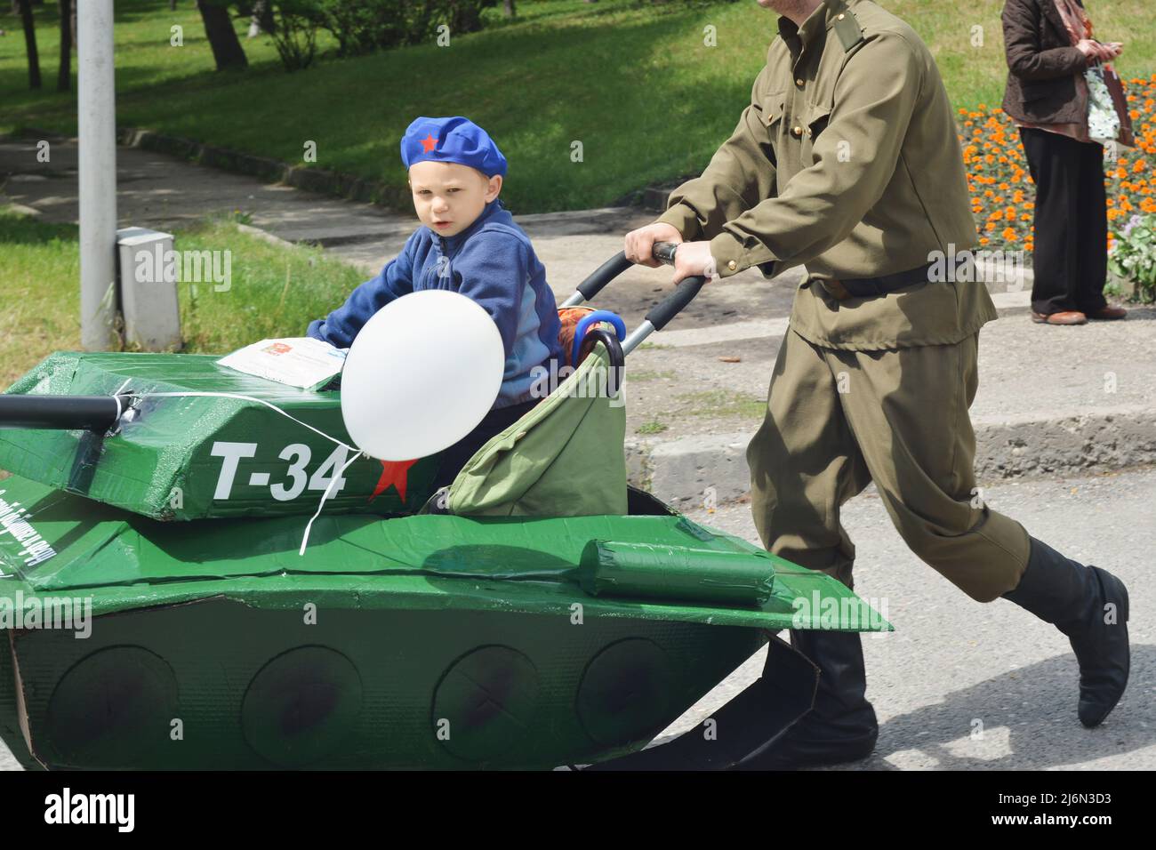 PYATIGORSK, RUSSIA - MAY 09, 2017: A little boy in artificial tank ...