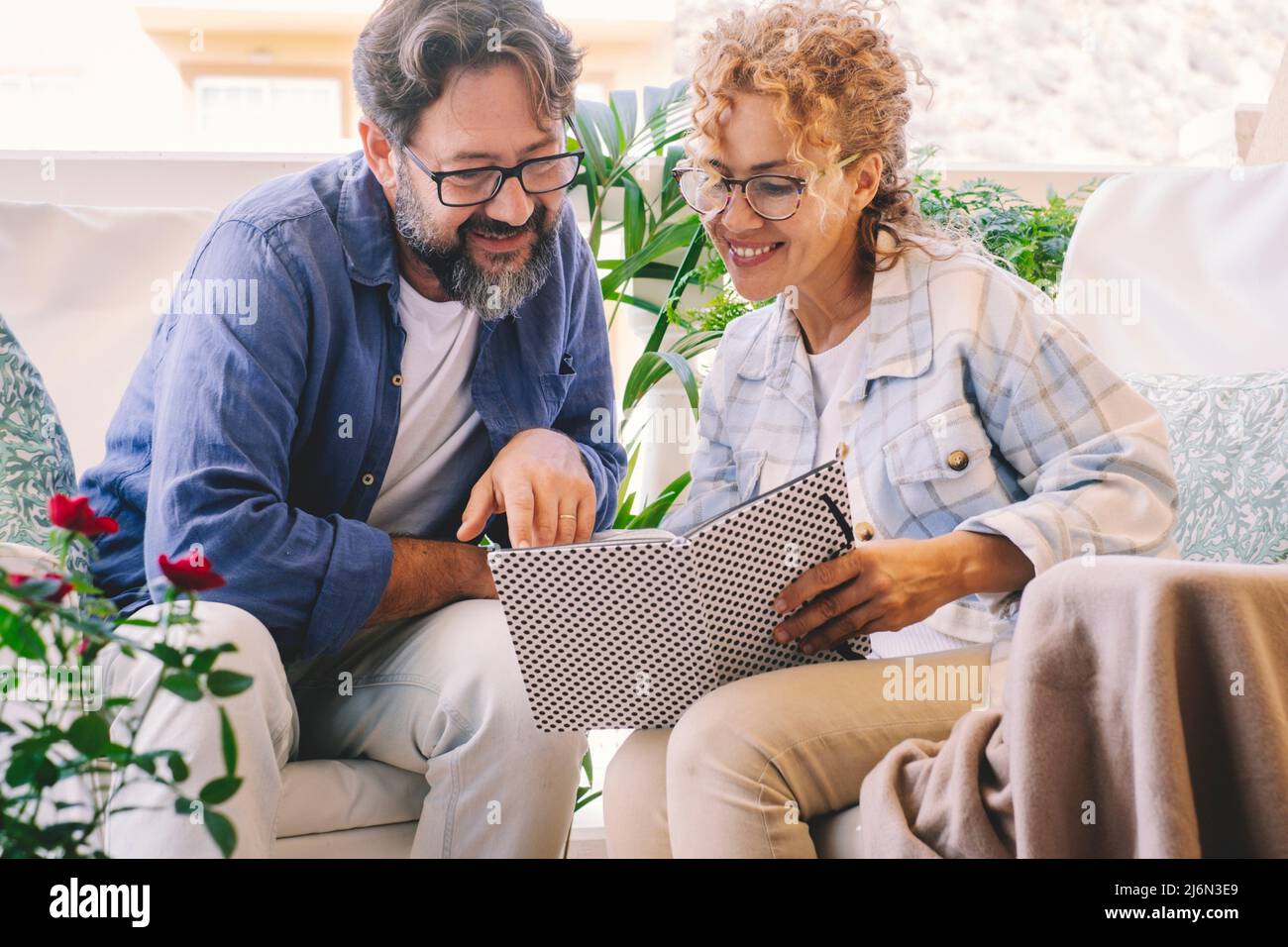 Adults Reading Books Together