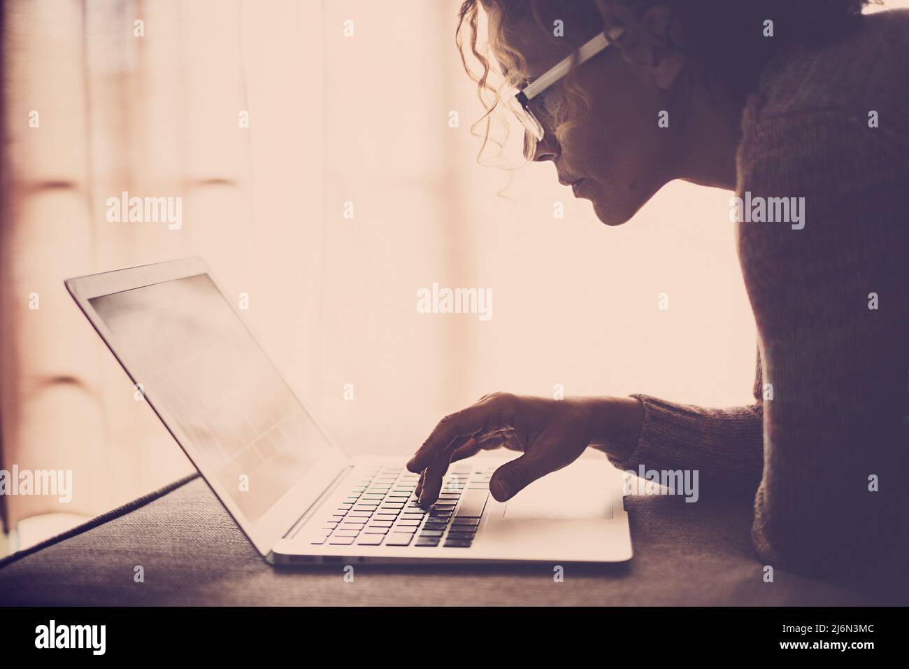 Female working writing hi-res stock photography and images - Alamy
