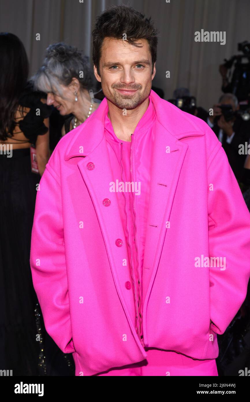 Sebastian Stan walking on the red carpet at the 2022 Metropolitan ...