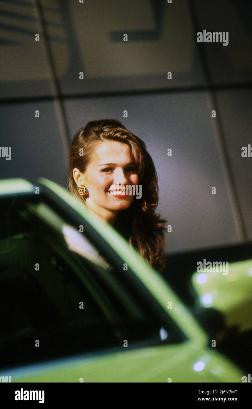 1994 UK Motorshow at the NEC Birmingham. Promotional models on various ...