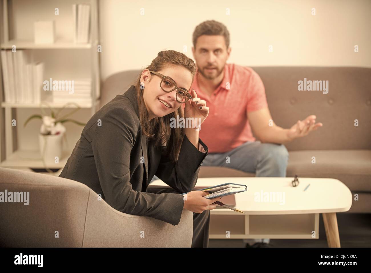 man sitting at psychologist woman solving problem, therapy Stock Photo ...