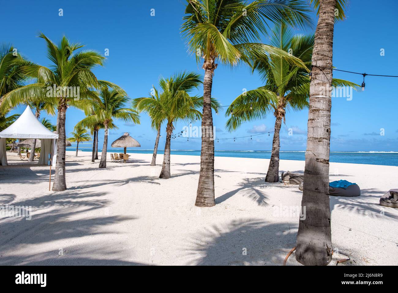 Tropical beach with white sand and palm trees Le Morne Mauritius, white ...