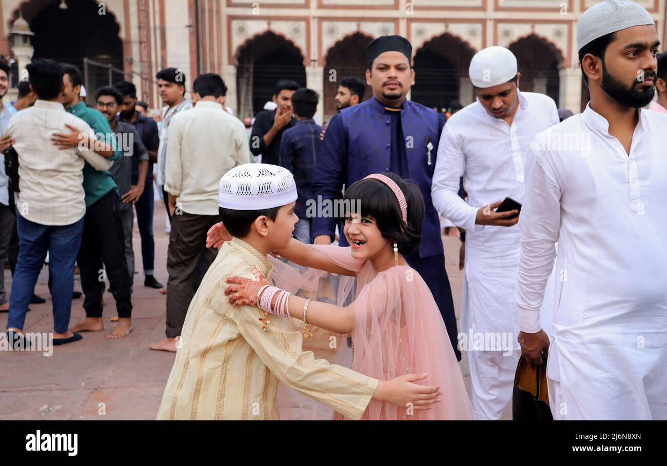 Muslim children greet each other after offering Eid al-Fitr special ...