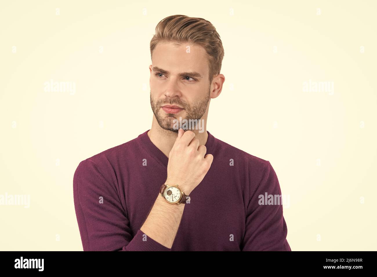 Handsome guy with unshaven face hair look thoughtful in casual style ...