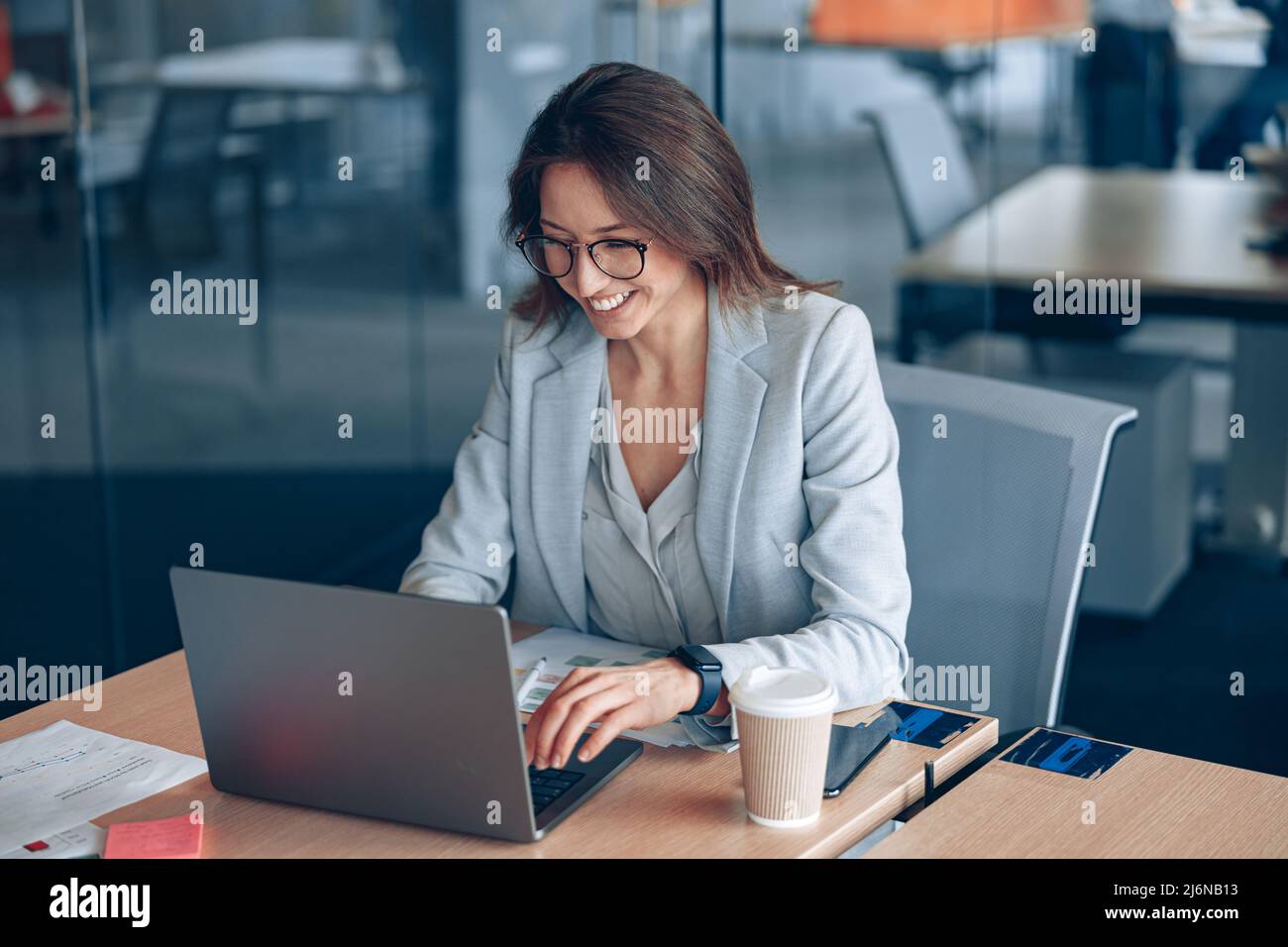 Professional business lady working on hi-res stock photography and ...