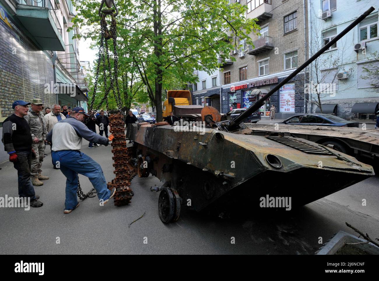 Workers install a destroyed Russian BMD-2 (Airborne Fighting Vehicle ...