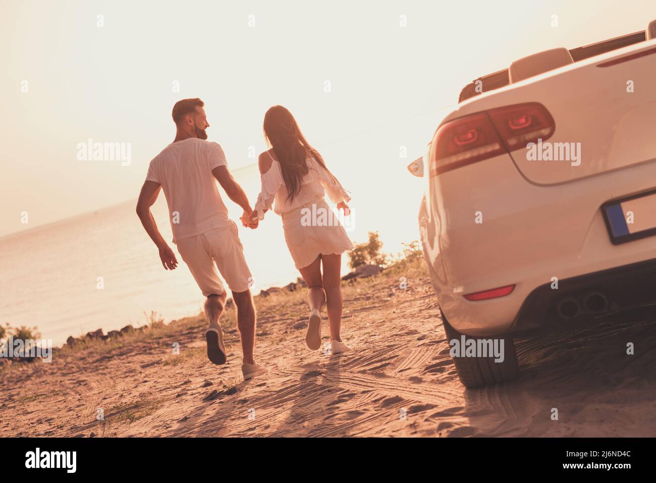 Rear back behind view portrait of handsome beautiful cheerful dreamy ...