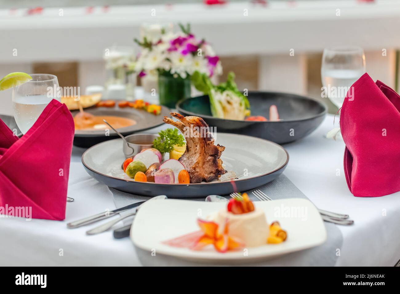 Table with food and drinks for romantic dinner for couple in outdoors ...