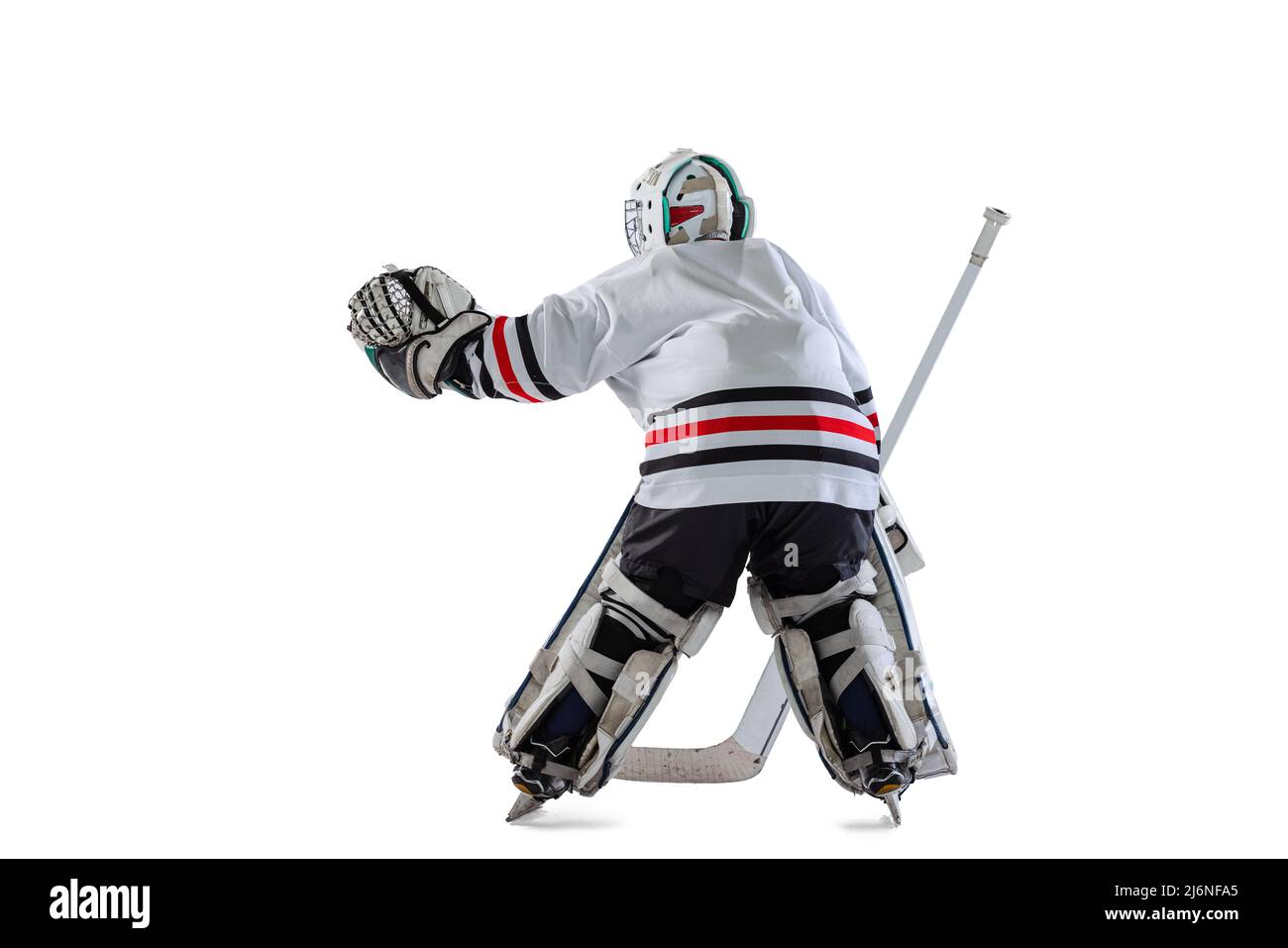 Back view portrait of young boy, child, hockey player training isolated ...