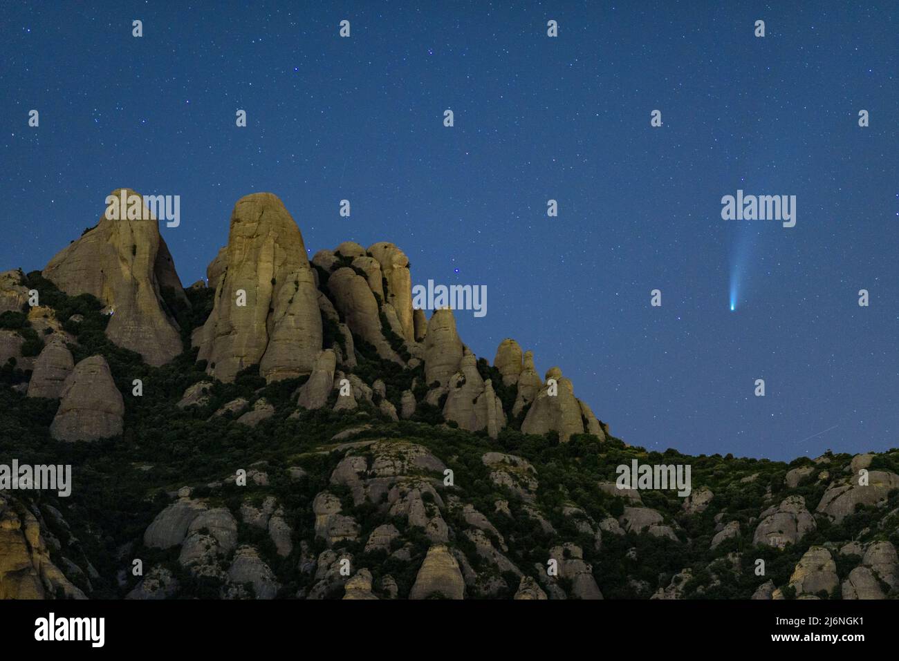 Neowise comet over the peaks of Montserrat (Barcelona province ...