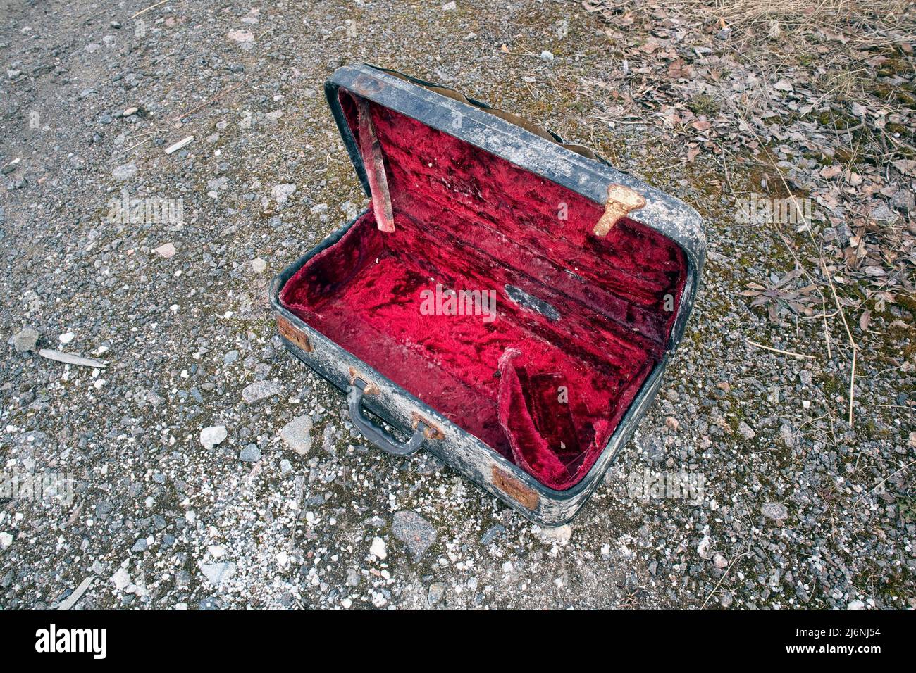 Old abandoned suitcase outdoors Stock Photo - Alamy