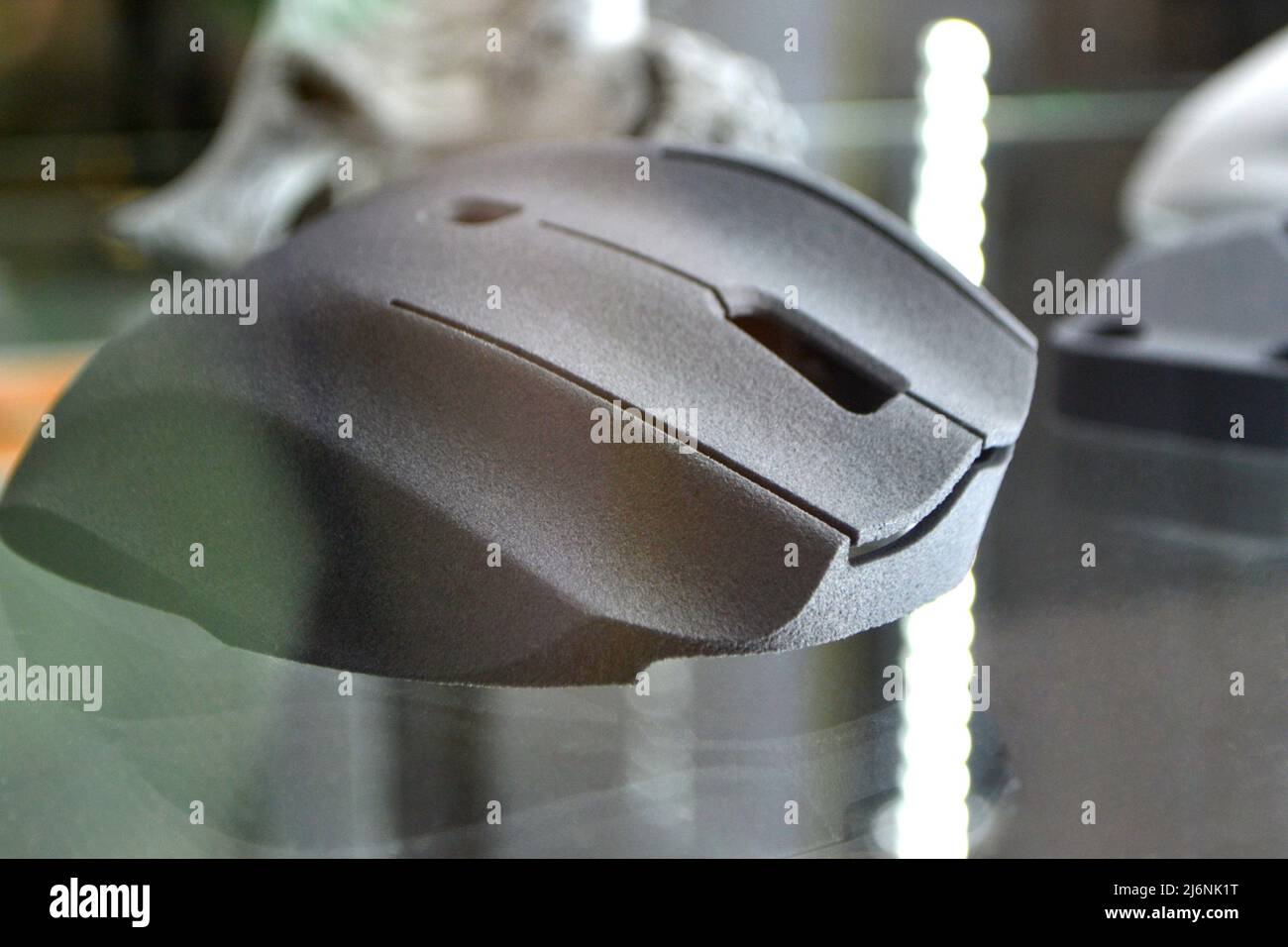 Gray computer mouse printed on 3D printer. Model printed on 3D printer ...