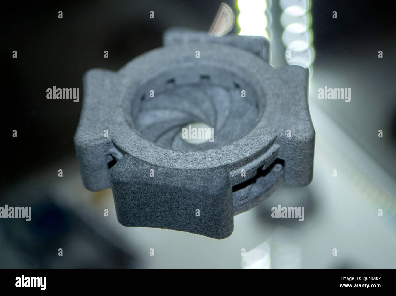 One gray model camera shutter printed on 3D printer. Object printed 3D ...
