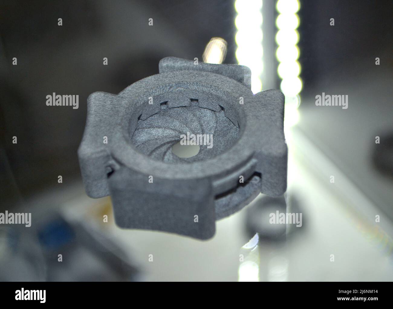 One gray model camera shutter printed on 3D printer. Object printed 3D ...