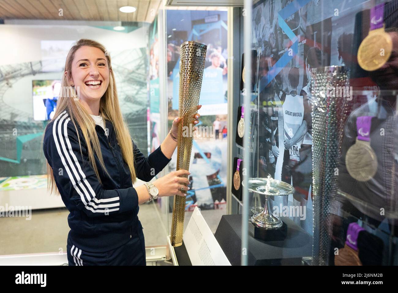 Six-time Olympic medal-winning cyclist Laura Kenny places an Olympic ...