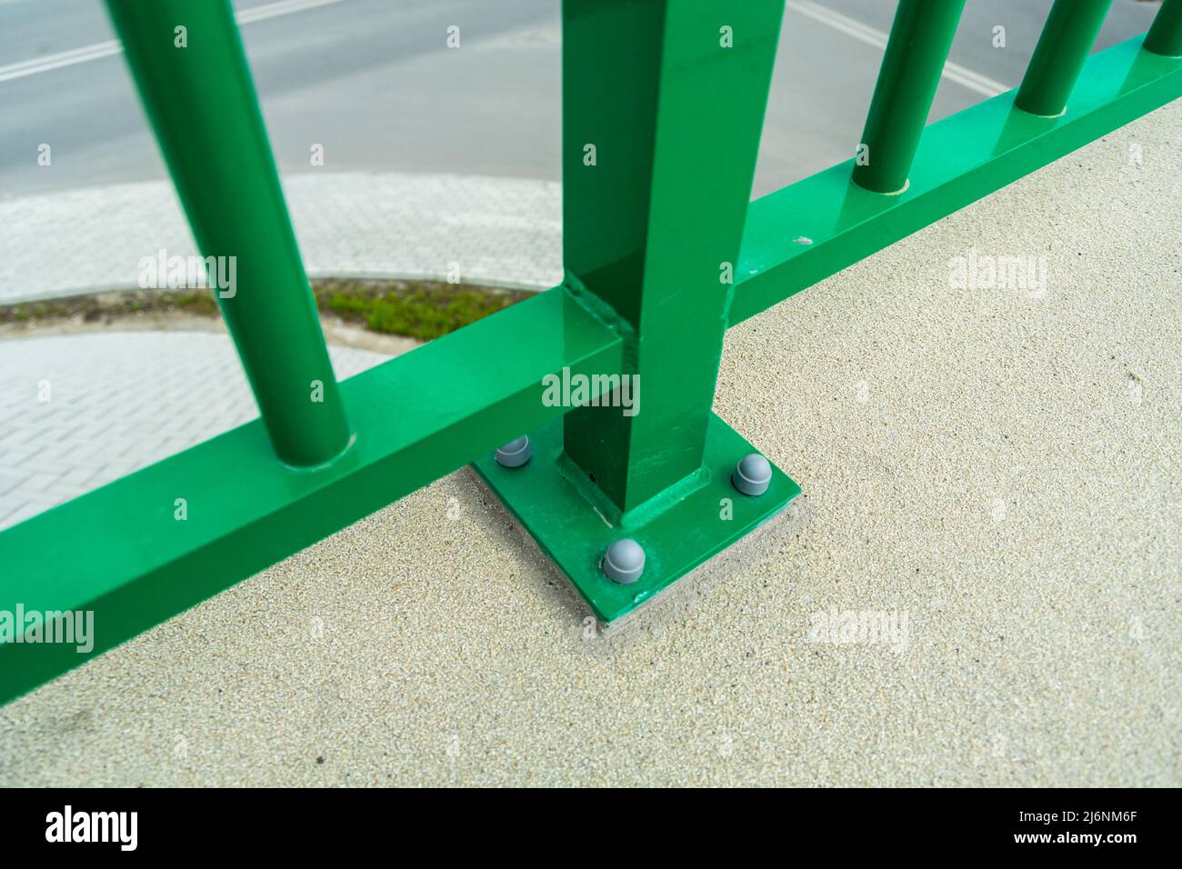 Bolt on railing element for concrete base Stock Photo - Alamy