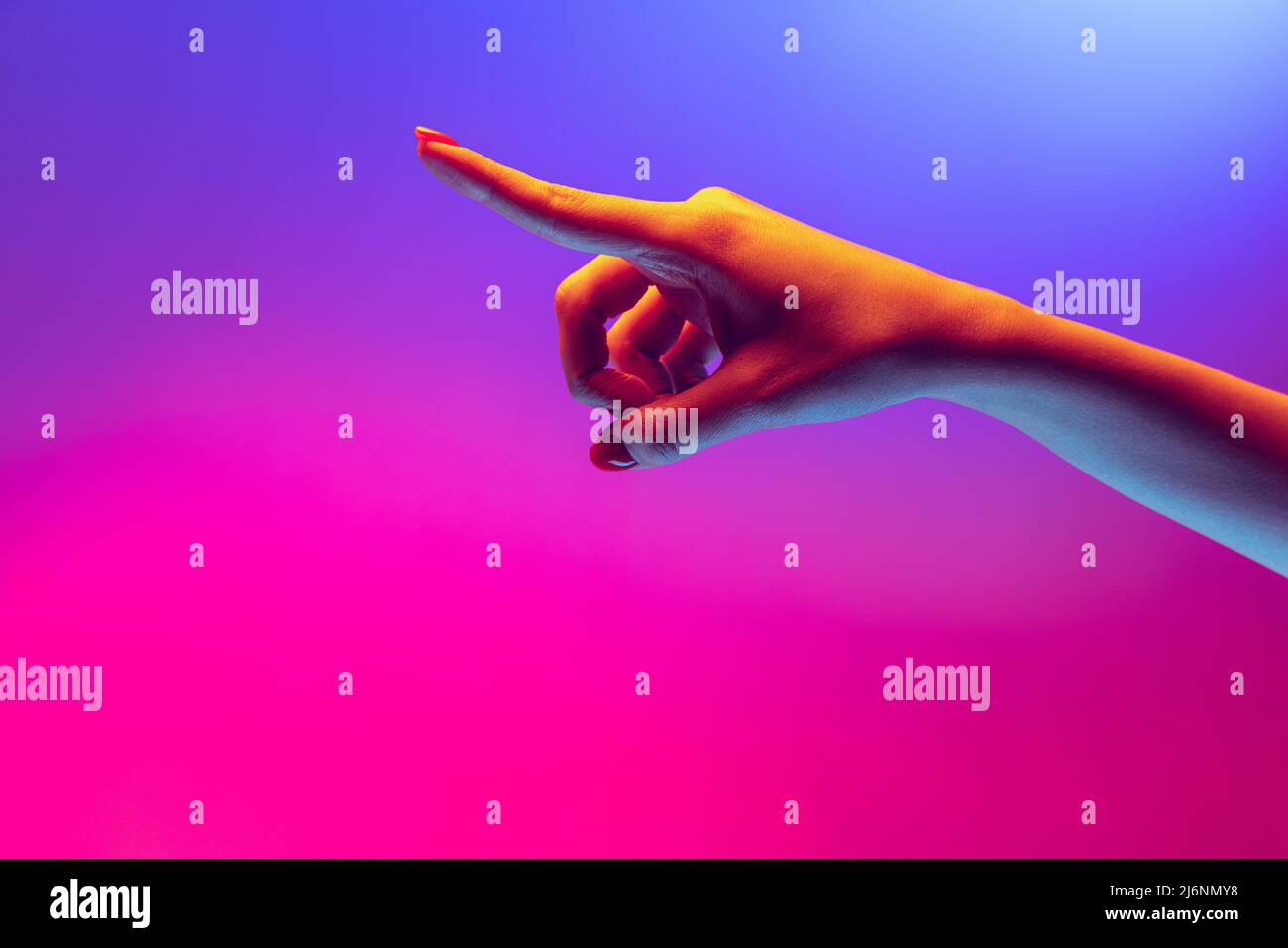 Human hand gesturing isolated on gradient purple-pink background in ...