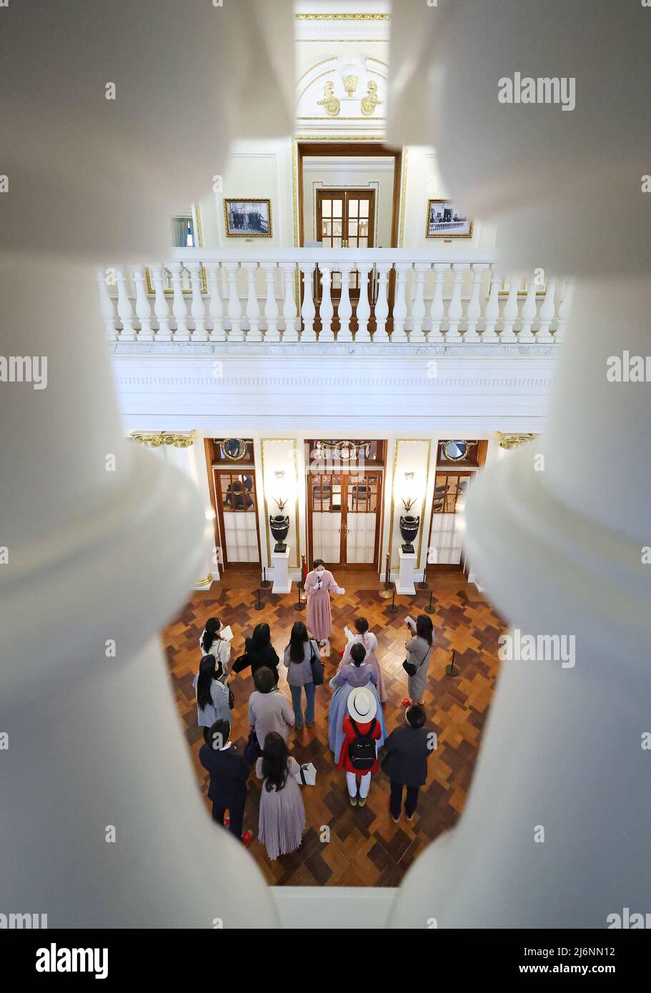 Dreamy night at palace Visitors tour Deoksu Palace's Seokjojeon Hall, a ...