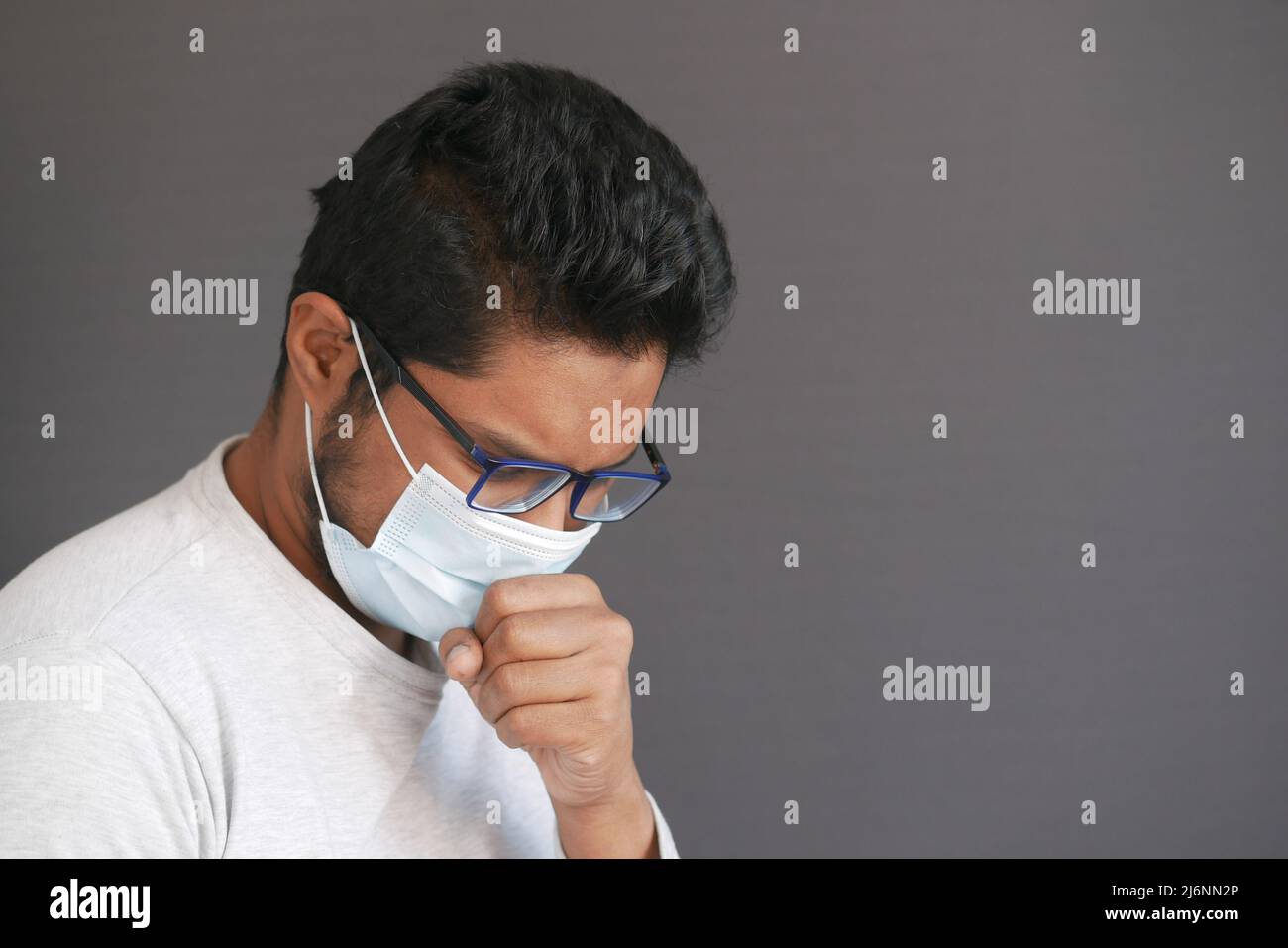 Sick man got flu allergy sneezing and blowing nose Stock Photo - Alamy