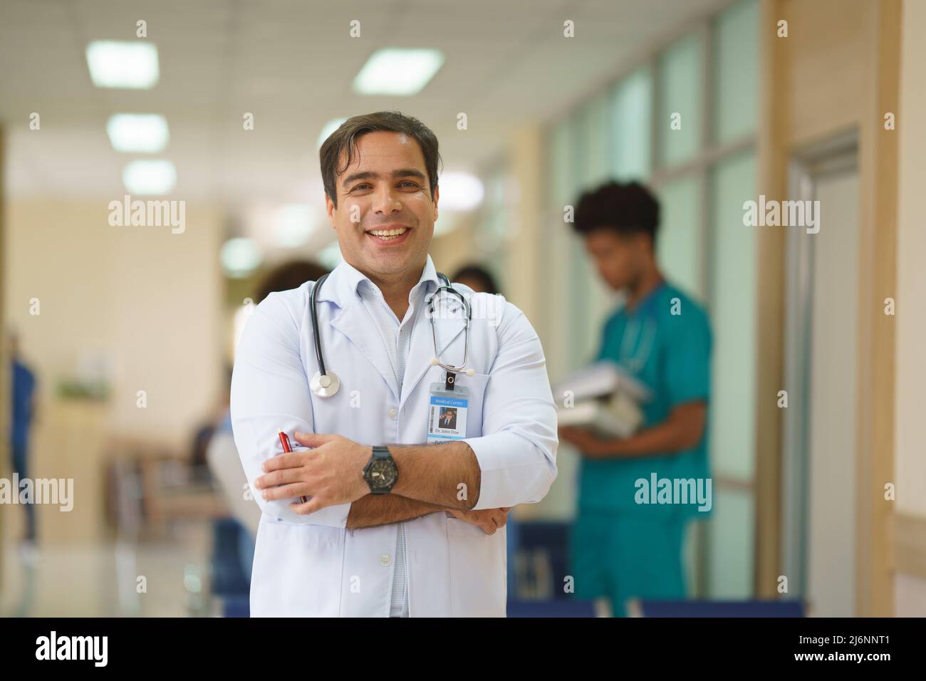 doctor leading medical team at hospital, stethoscope around neck Stock ...