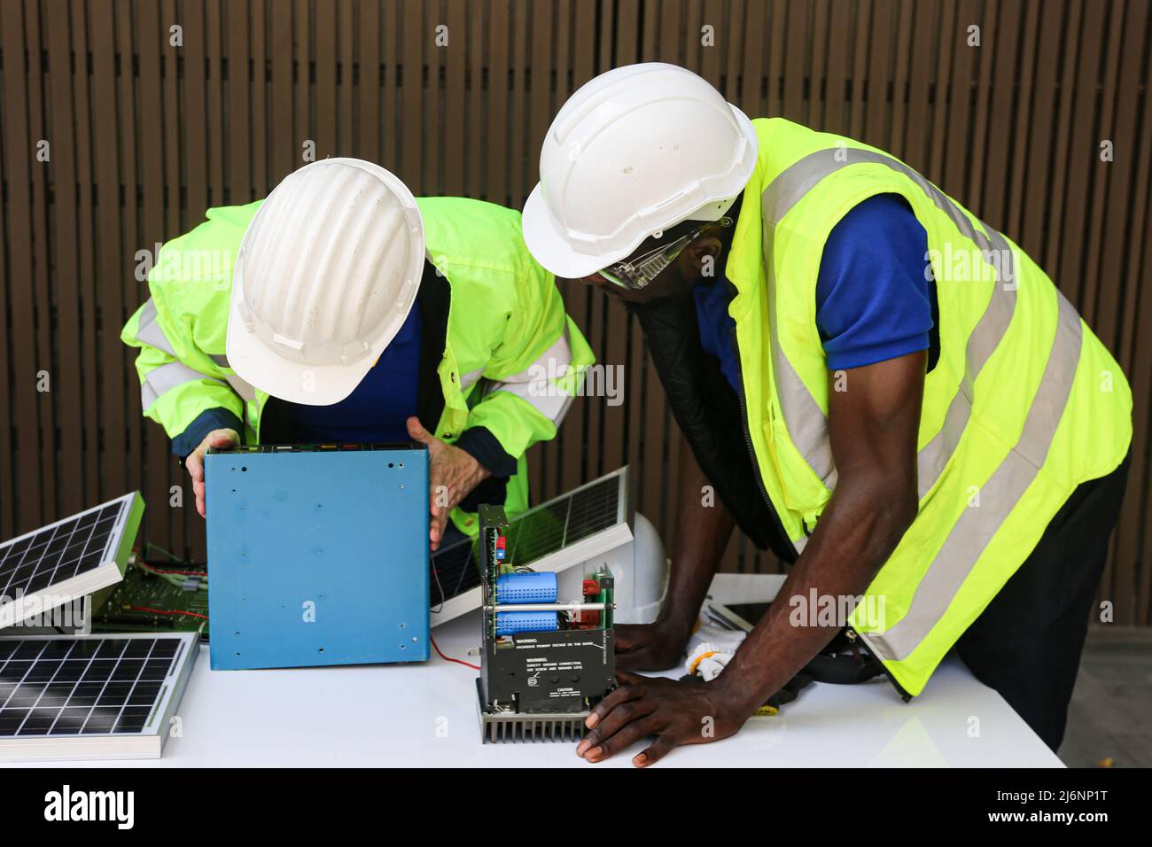 The factory engineer configures a complex production plant Stock Photo ...