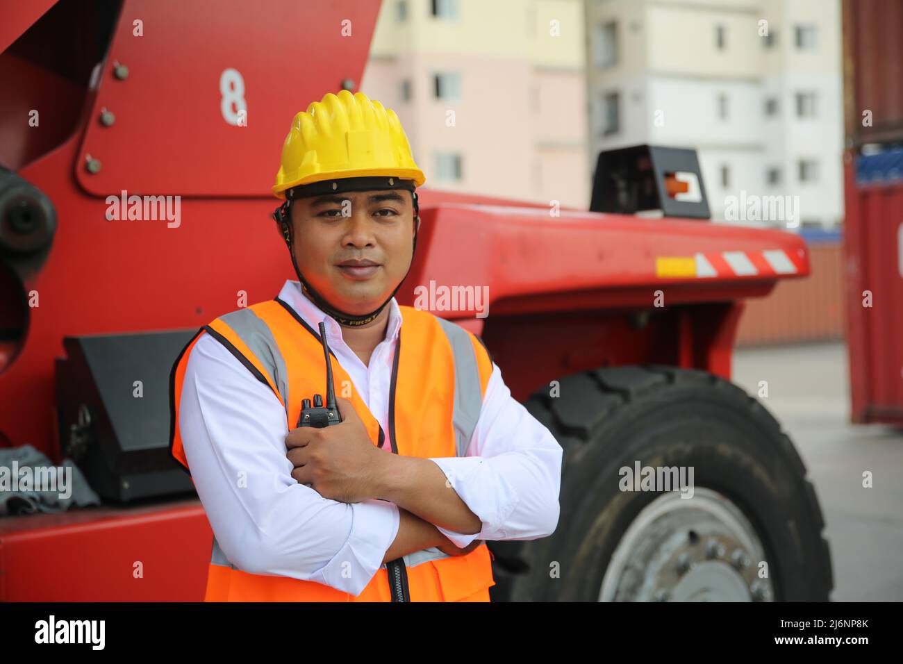 Foreman control Industrial Container Cargo freight ship at industry ...